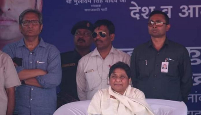 NDTV’s Ravish Kumar seen on the stage of a SP-BSP rally in UP attended ...