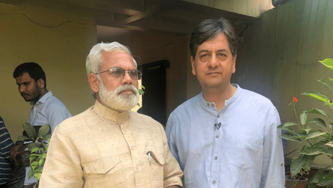 Ex-NDTV CEO Vikram Chandra poses with a Modi lookalike in Varanasi ...