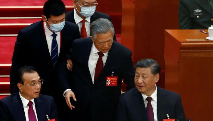 China's ex-president Hu Jintao escorted out of party meeting