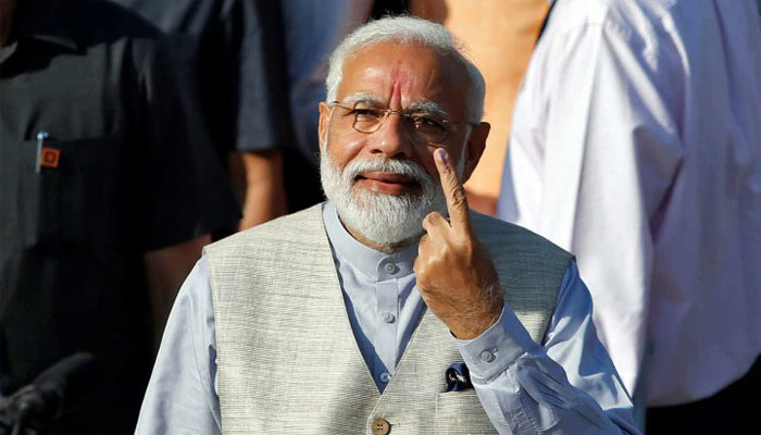 PM Modi casts his vote in Ahmedabad during second phase of Gujarat ...