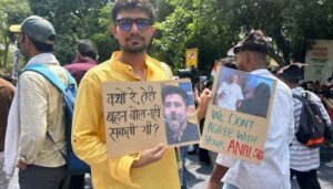Supporters of Cockroach Janta Party showcase derogatory posters about ...
